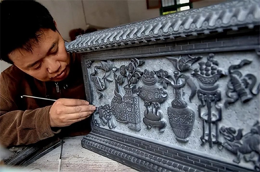 The three Huizhou-style crafts of carvings | govt.chinadaily.com.cn